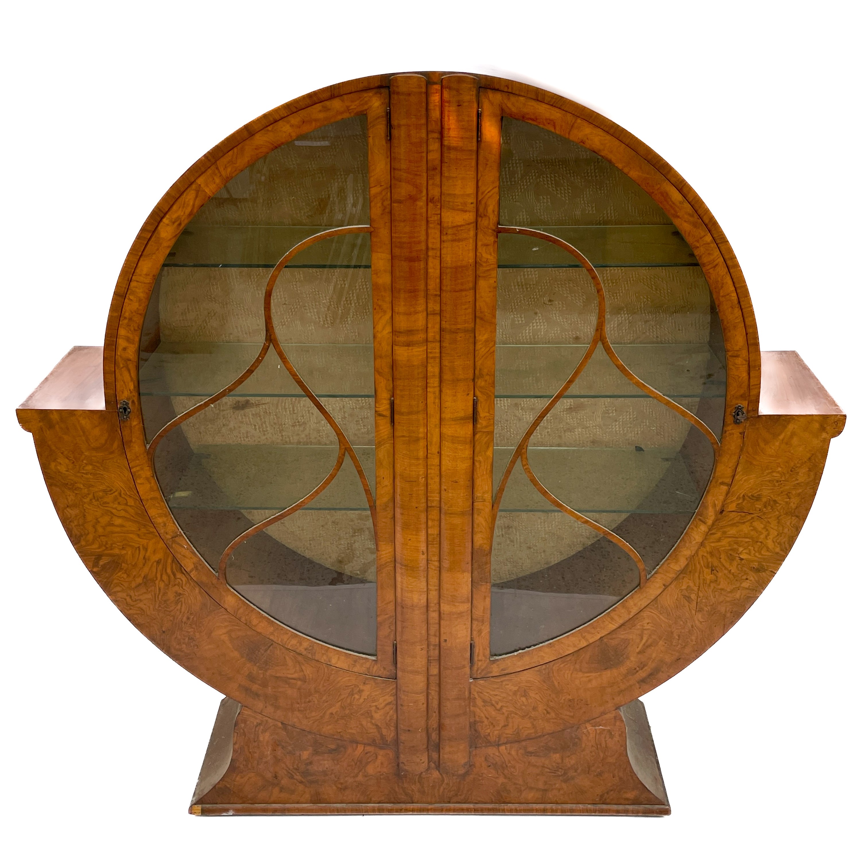 Lot 454 - An Art deco walnut circular display cabinet