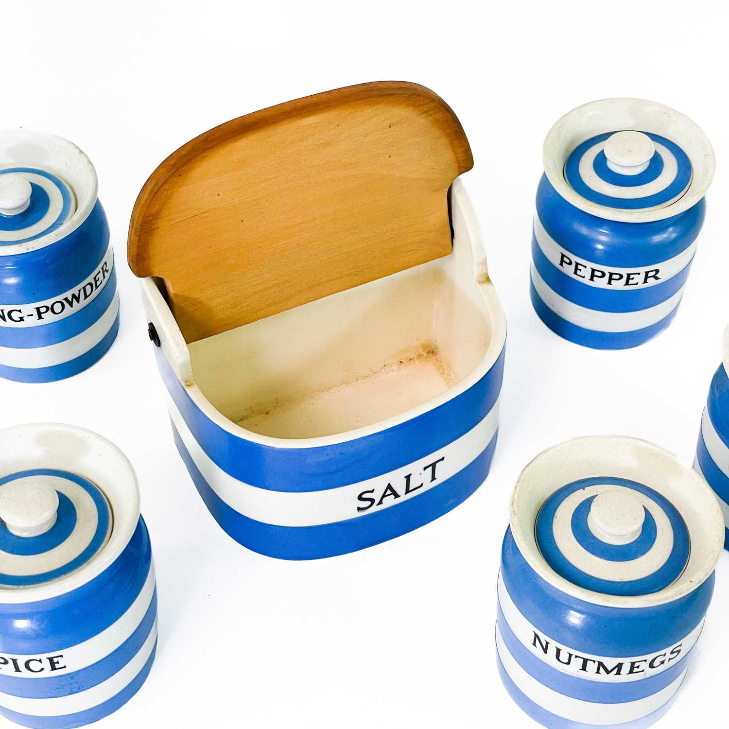 Lot 827 - Five T.G. Green Cornishware spice jars and a