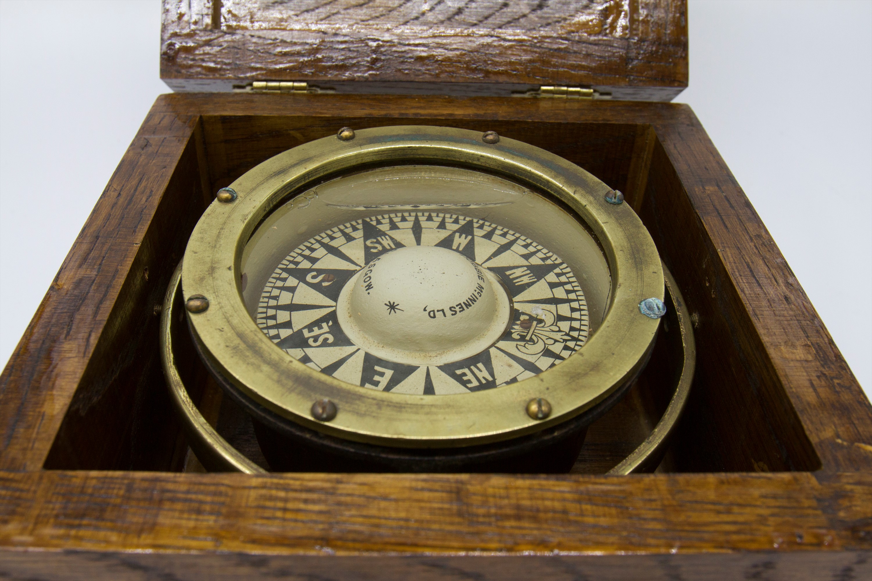 Lot 349 - A ship's brass gimble compass, by Dobbie