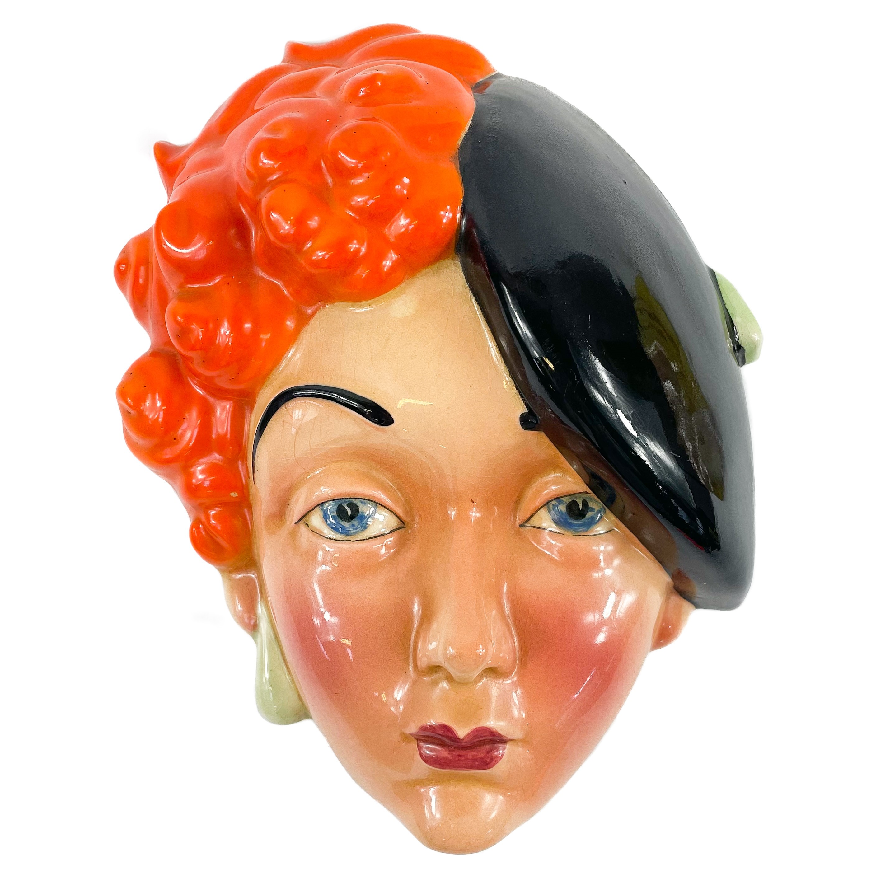 Lot 569 - An Art Deco Beswick wall mask.