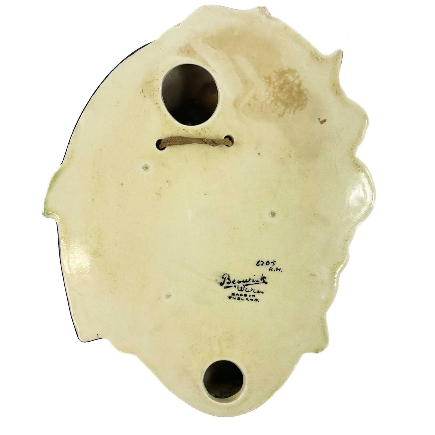 Lot 569 - An Art Deco Beswick wall mask.