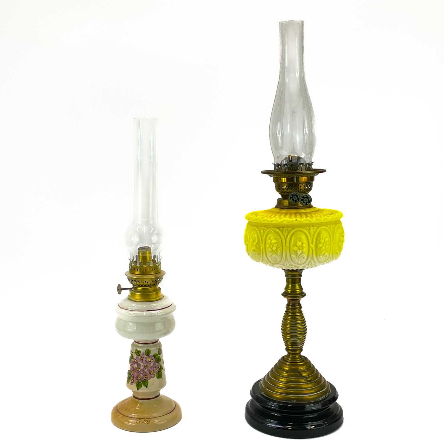 Lot 189 - A Victorian brass oil lamp with yellow glass