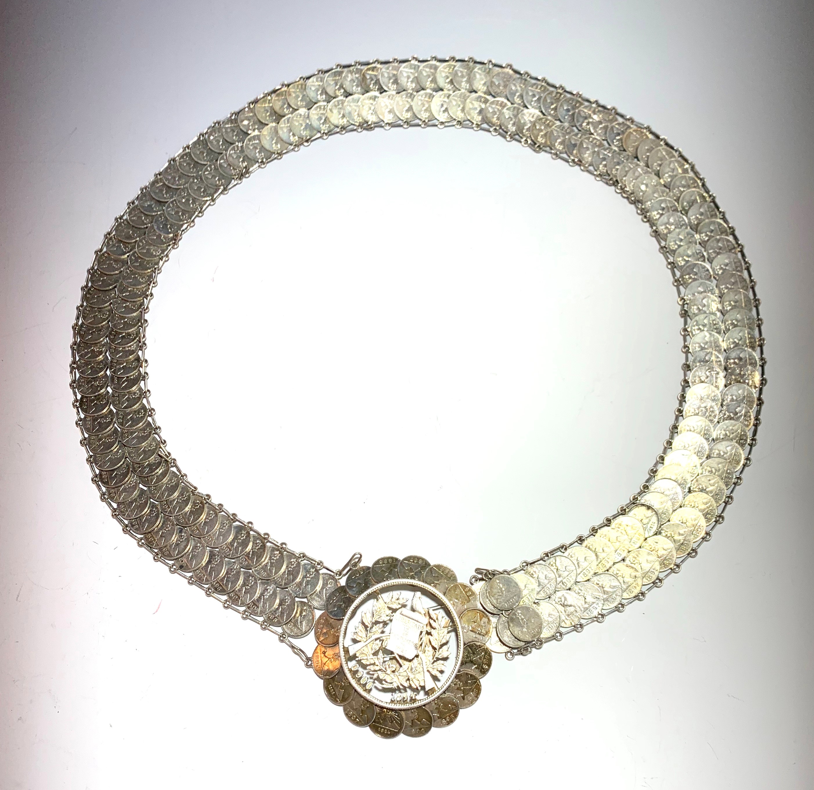 Lot 2478 - A coin belt, made from 1/4 real coins, the