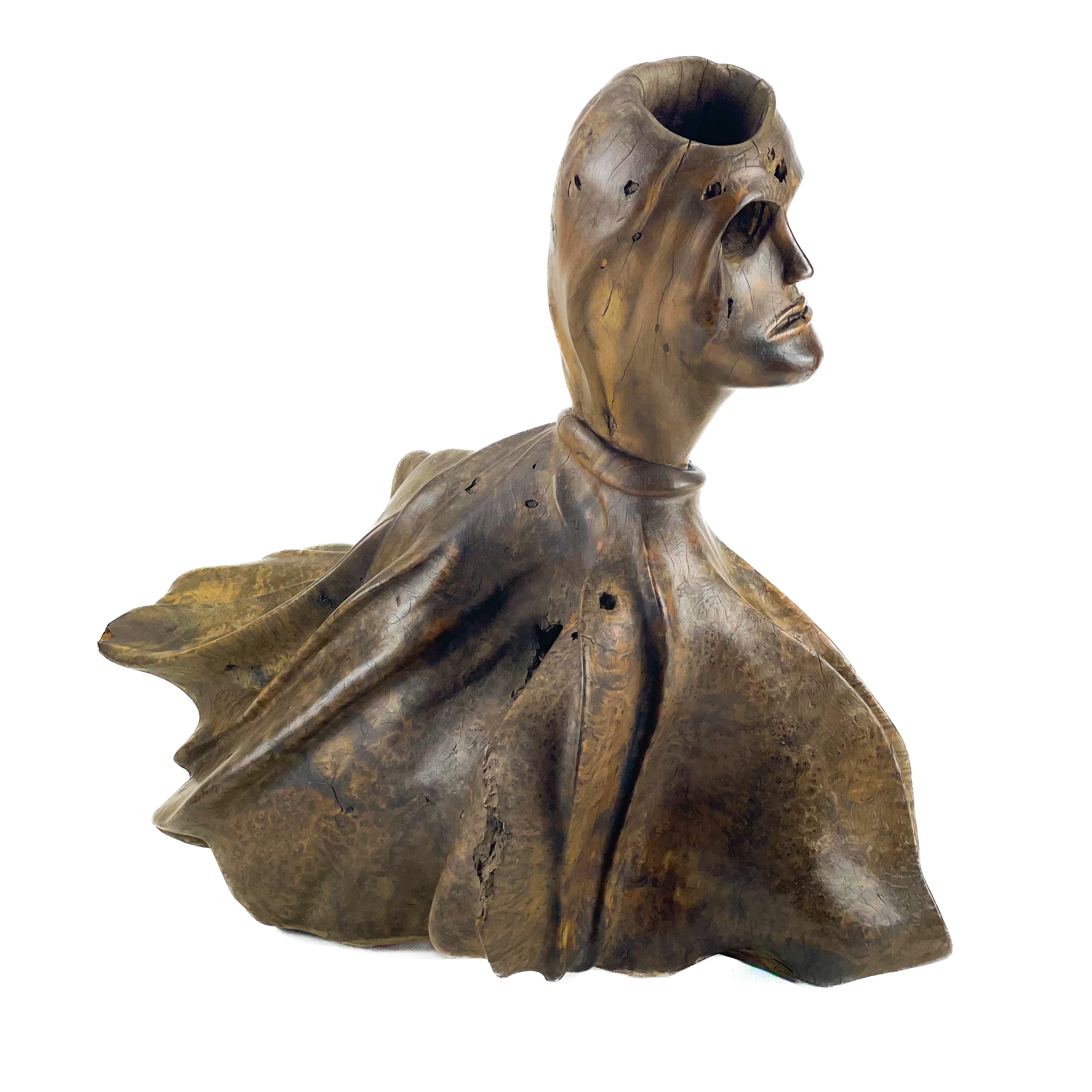 Lot 241 - A folk art burr walnut root ball carving.