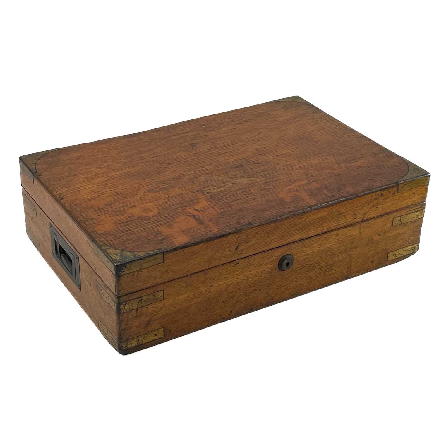 Lot 114 - An oak and brass bound campaign style box.