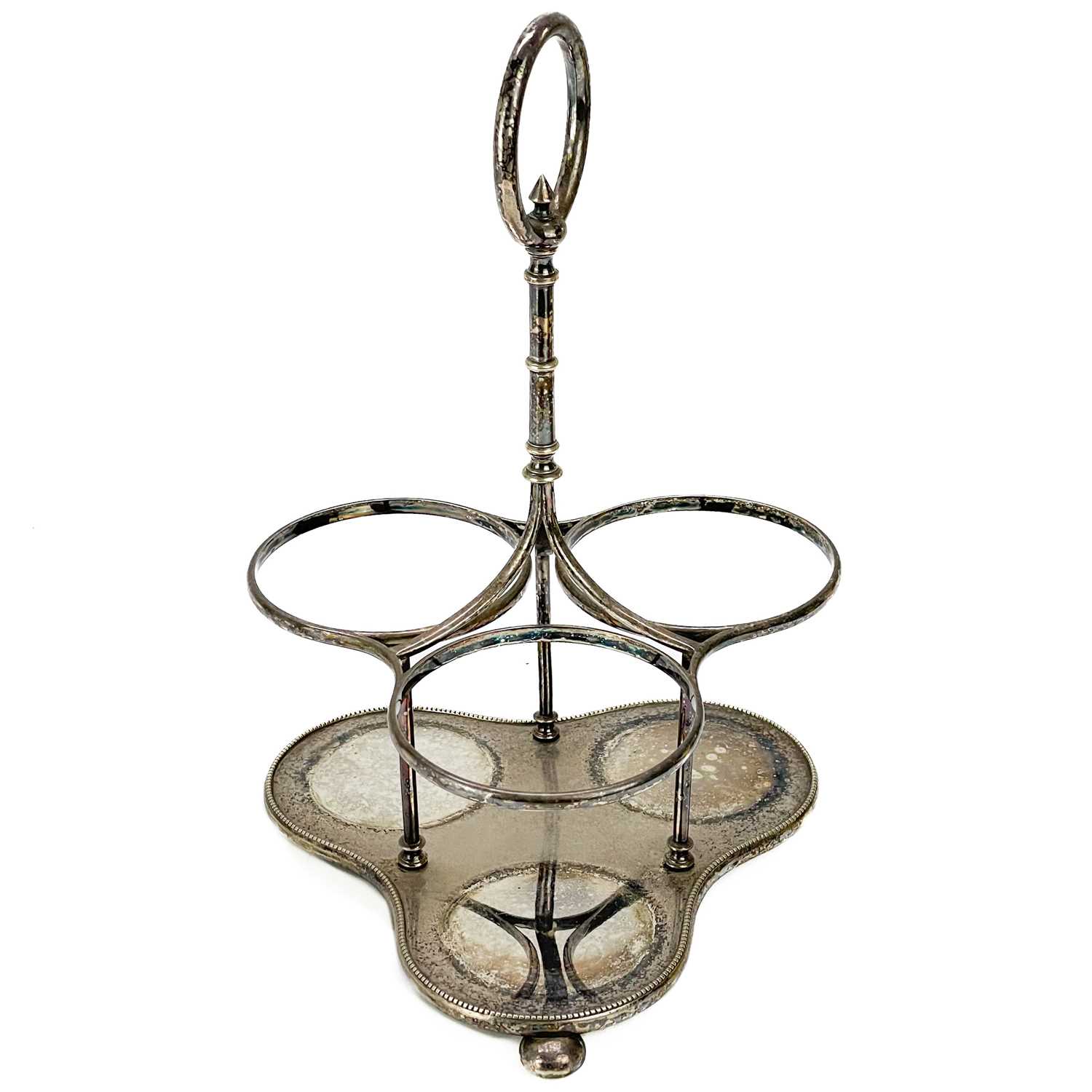 Lot 107 - A late Victorian three bottle silver plated